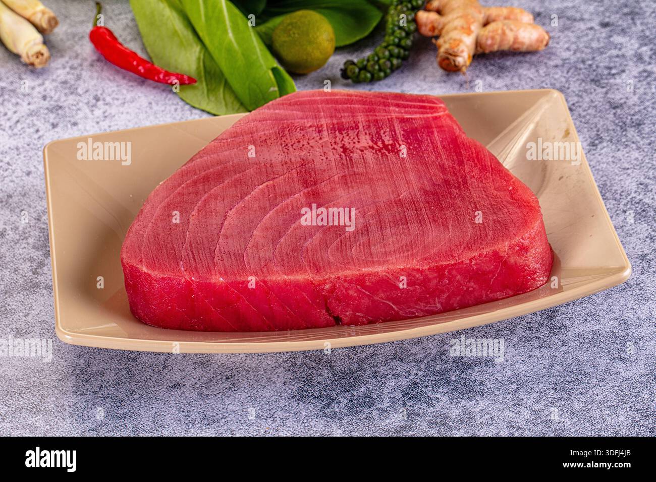 Raw fresh red Tuna fillet fish steak Stock Photo - Alamy