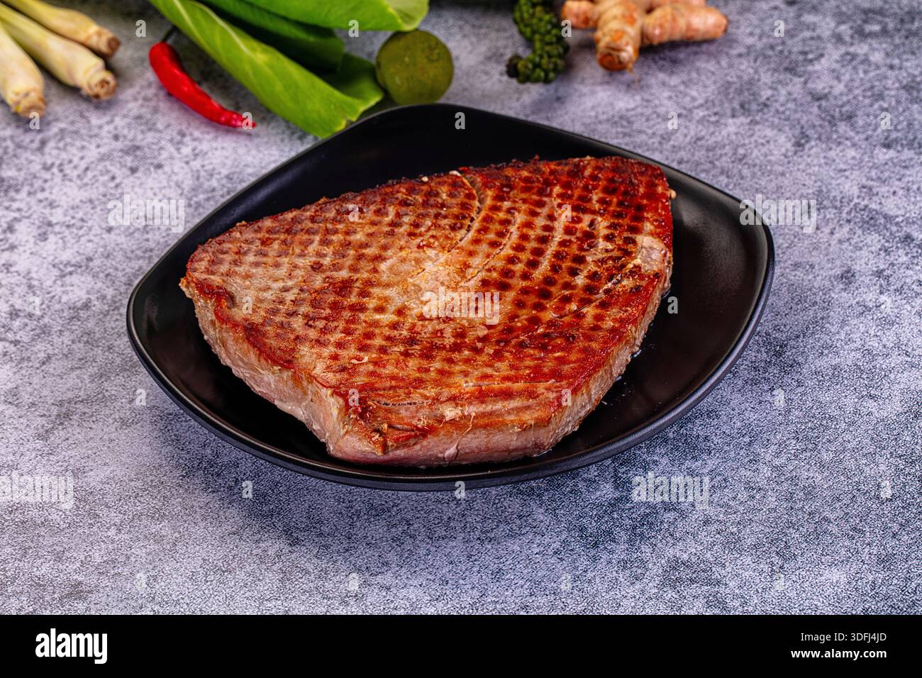 Fried gourmet tuna fish fillet steak Stock Photo - Alamy