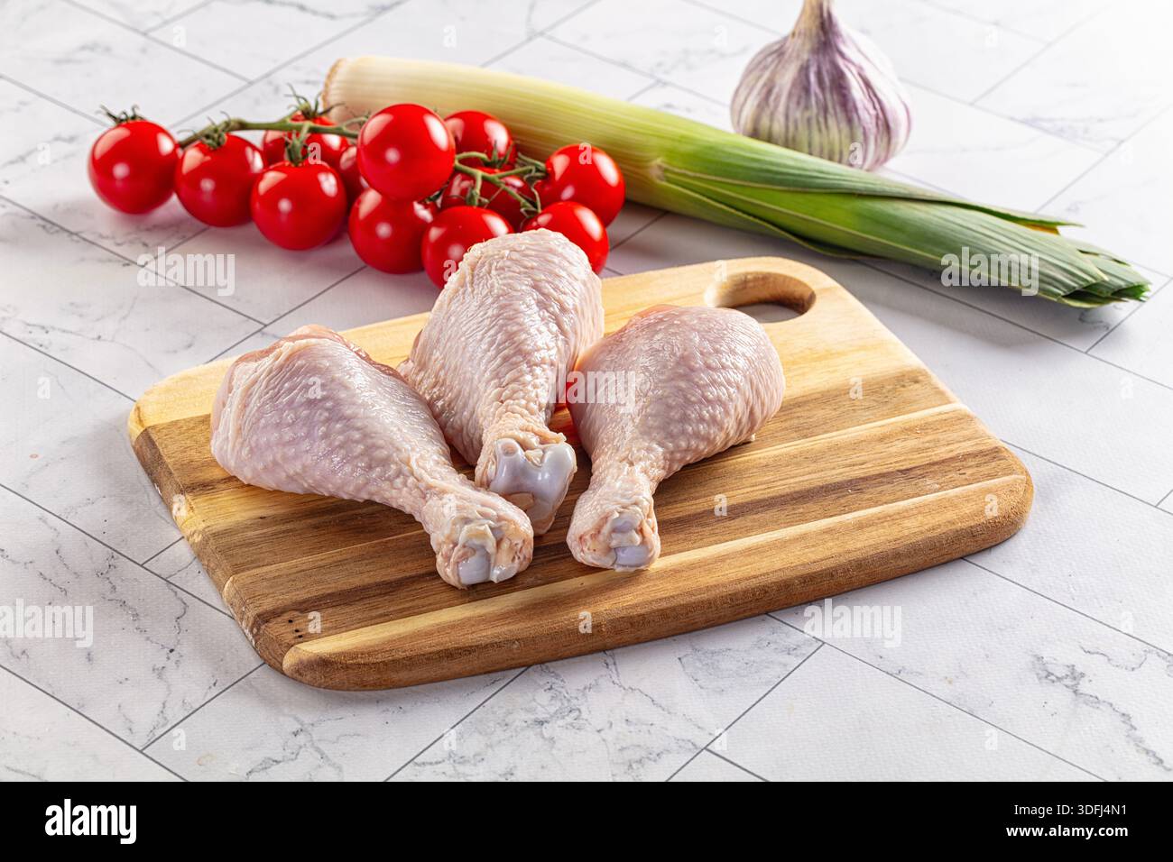 Fresh raw chicken drumsticks over board for cooking Stock Photo - Alamy