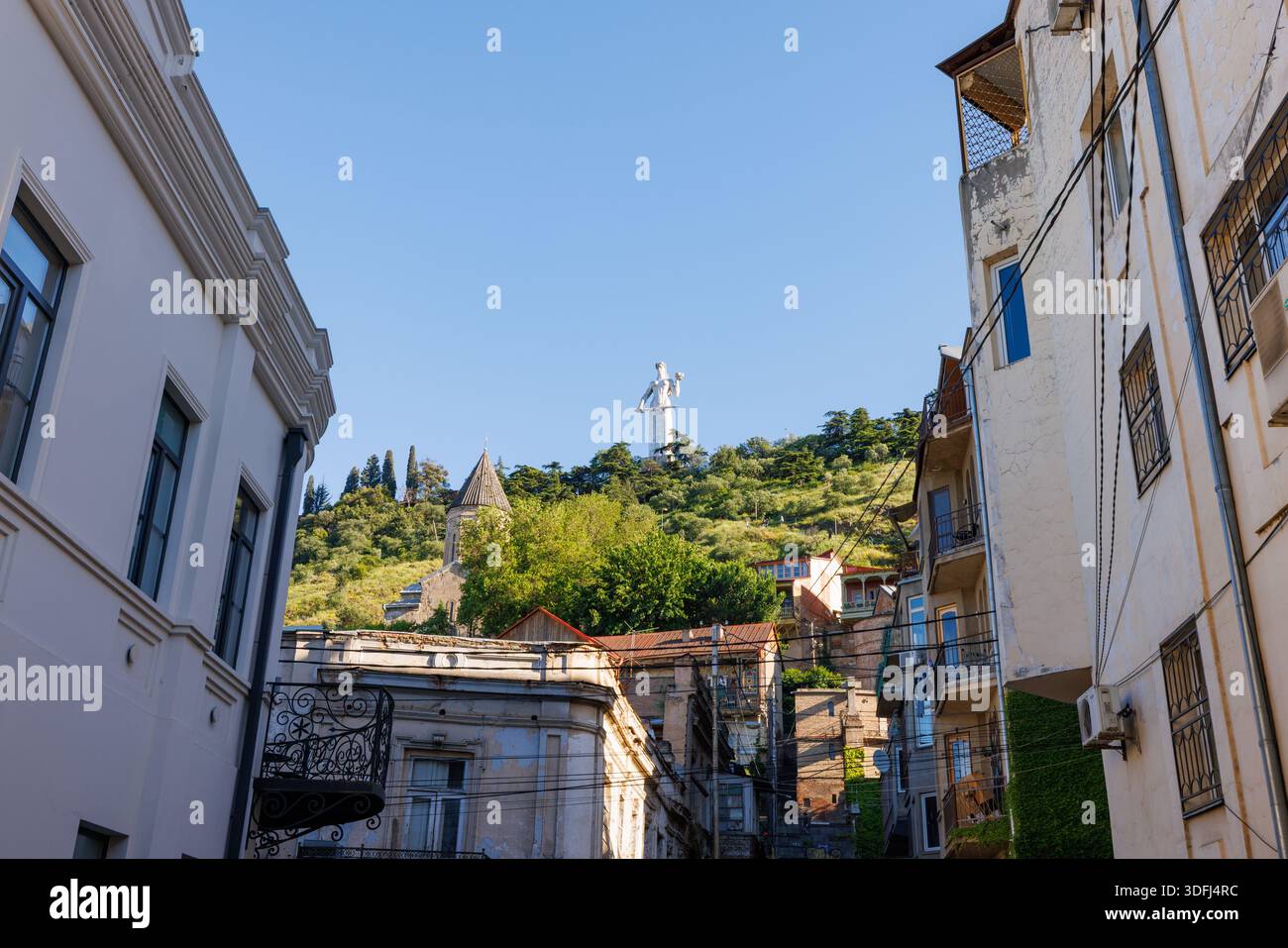 View of the Mother of Georgia statue on Narikala Hill from the streets ...