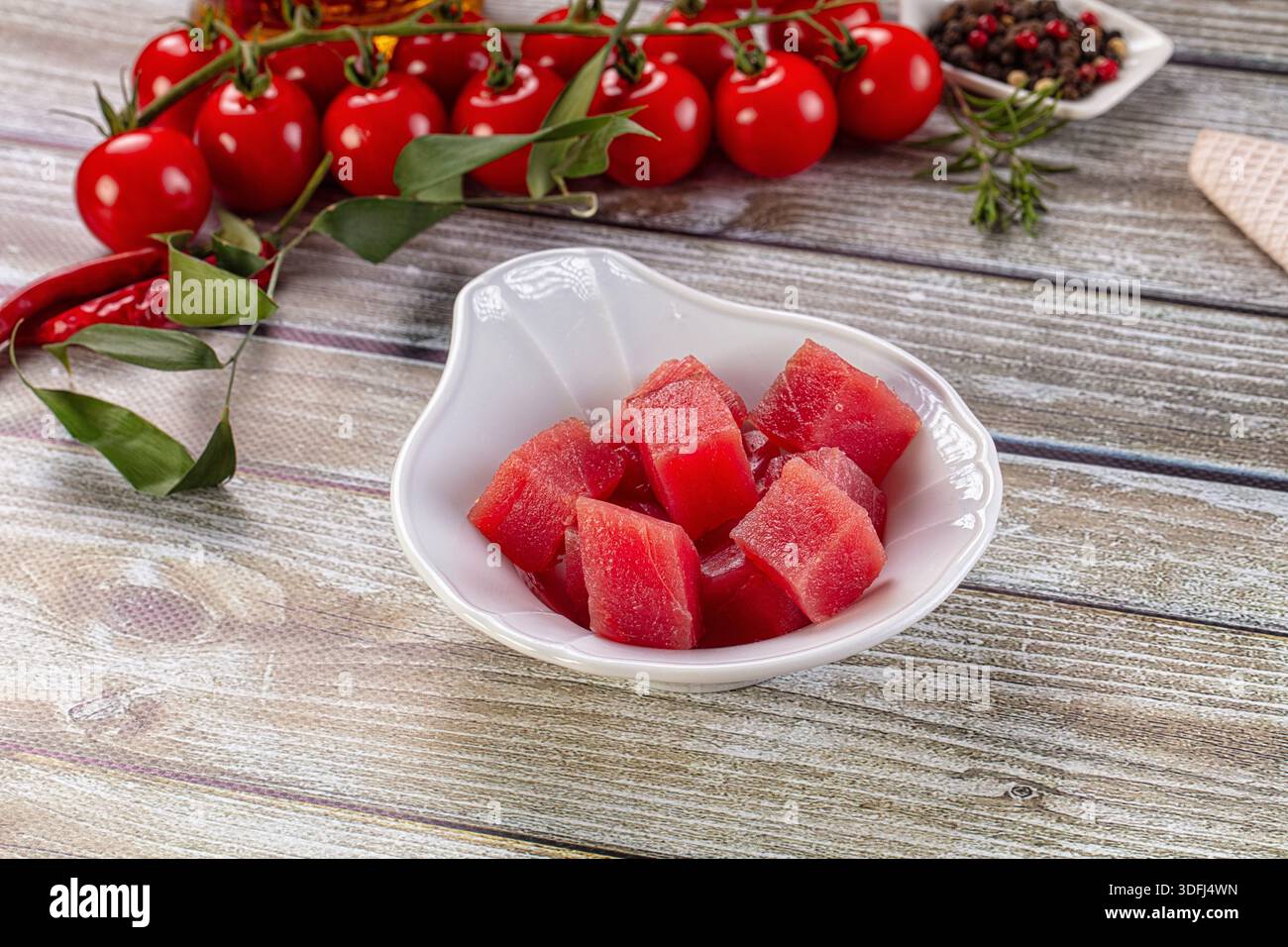 Raw tuna fish cubes heap for poke Stock Photo - Alamy