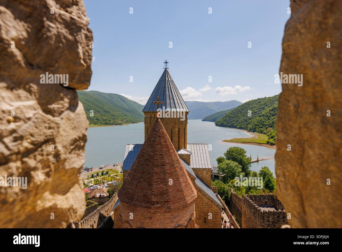 Scenic view of the church spire looking through the stone windows of ...