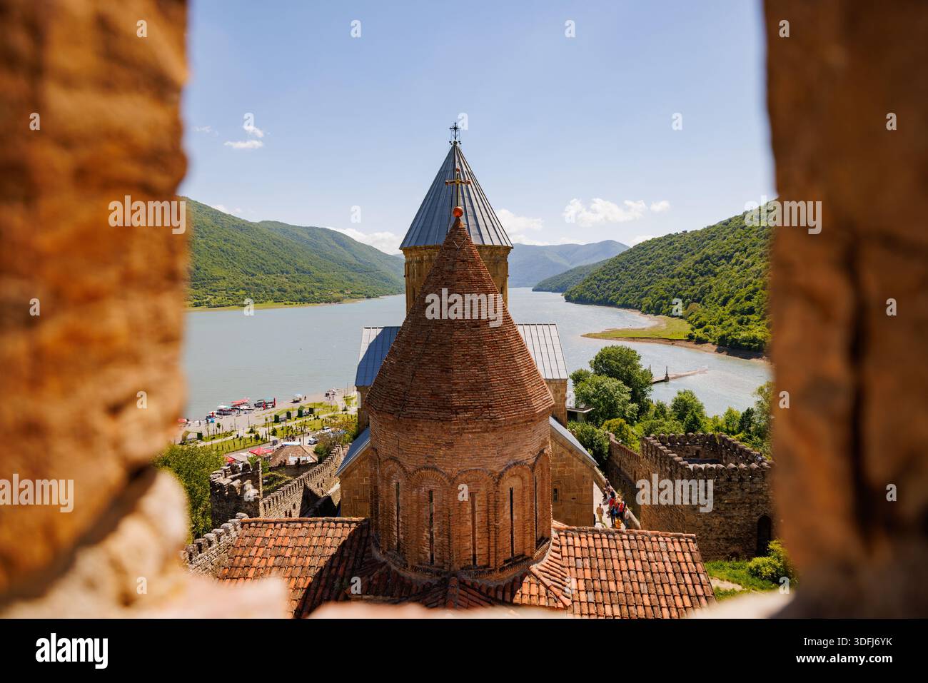 Scenic view of the church spire looking through the stone windows of ...