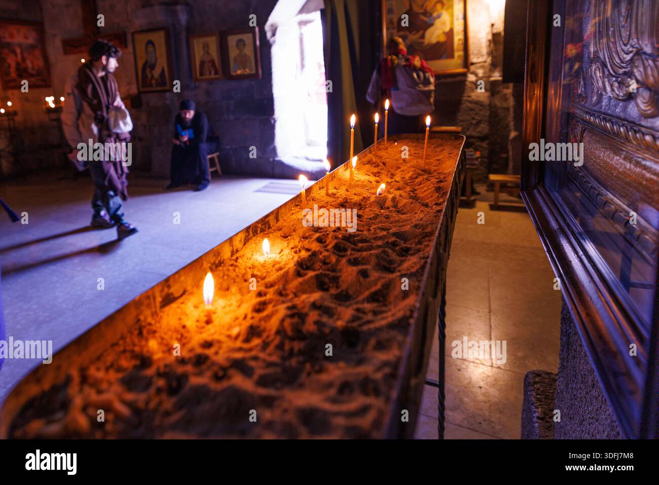 Gergeti, May 22, 2025. Tourist visit the Gergeti Trinity Church in the ...