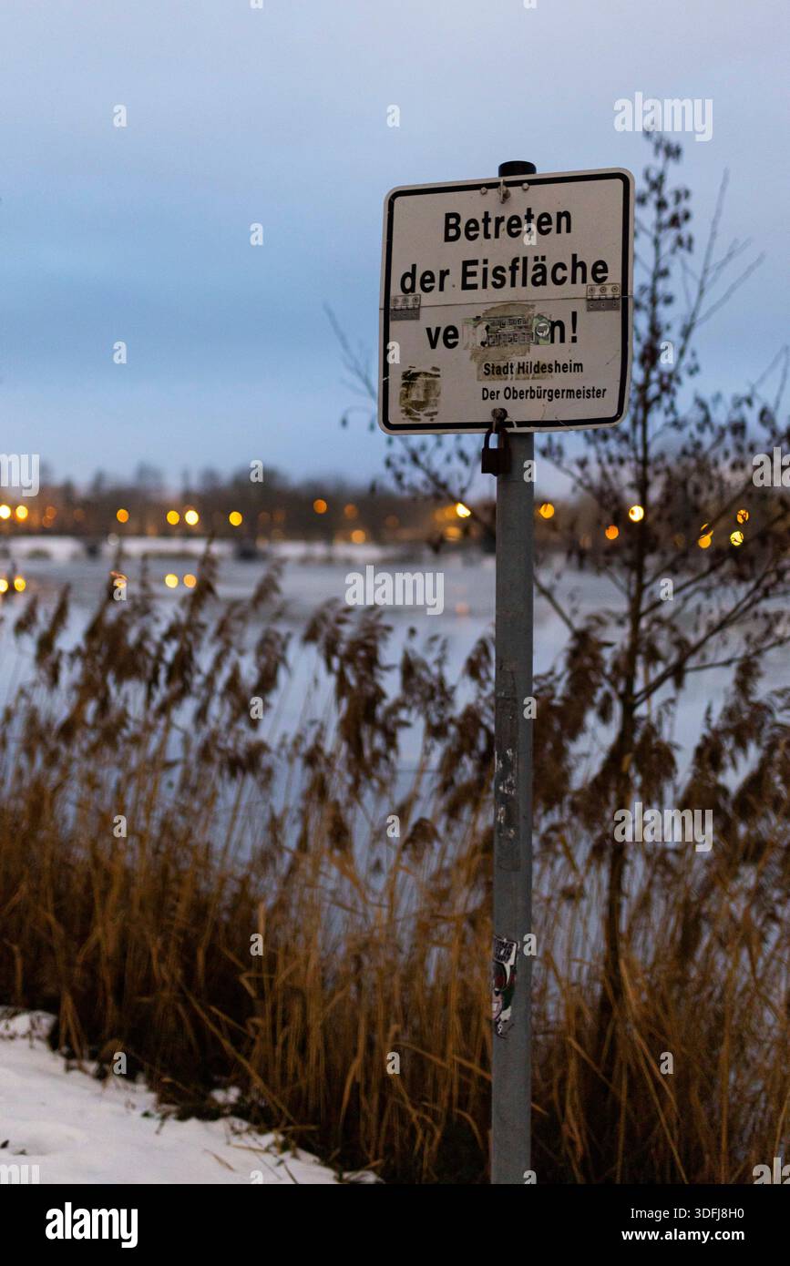 Hildesheim, Germany. 13th Jan, 2026. A sign reading "No walking on the ...