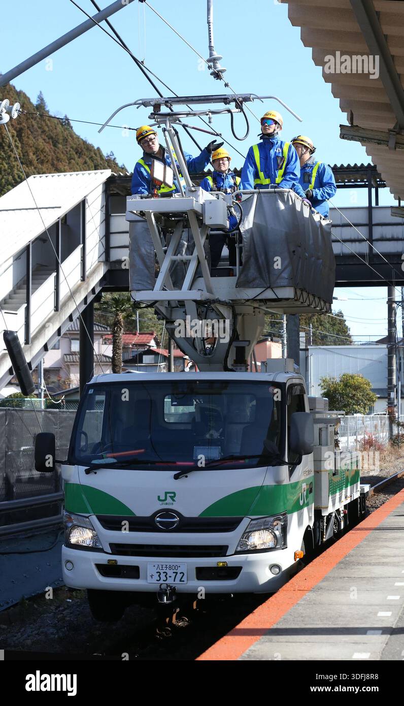 East Japan Railway Company Ome Line overhead wire inspection work is ...