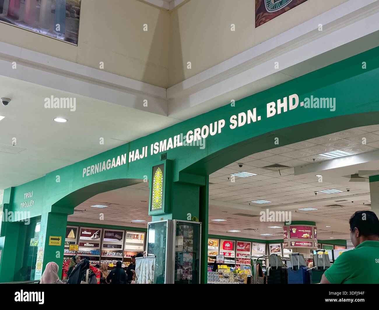 Kedah, Malaysia, December 3, 2025: Shoppers enter the popular Haji ...