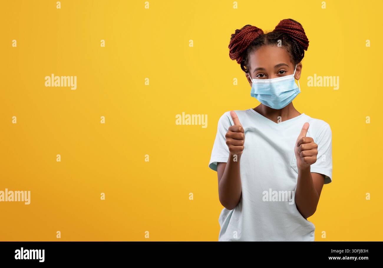 African american child showing thumb hi-res stock photography and ...