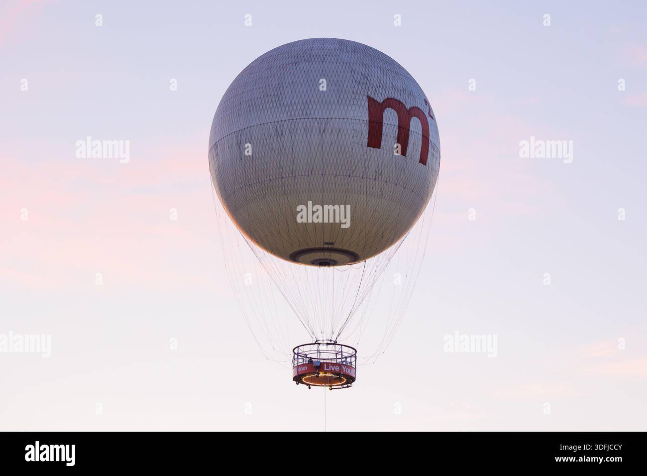 Tbilisi, May 23, 2025. Tourists experience the tethered hot air balloon ...