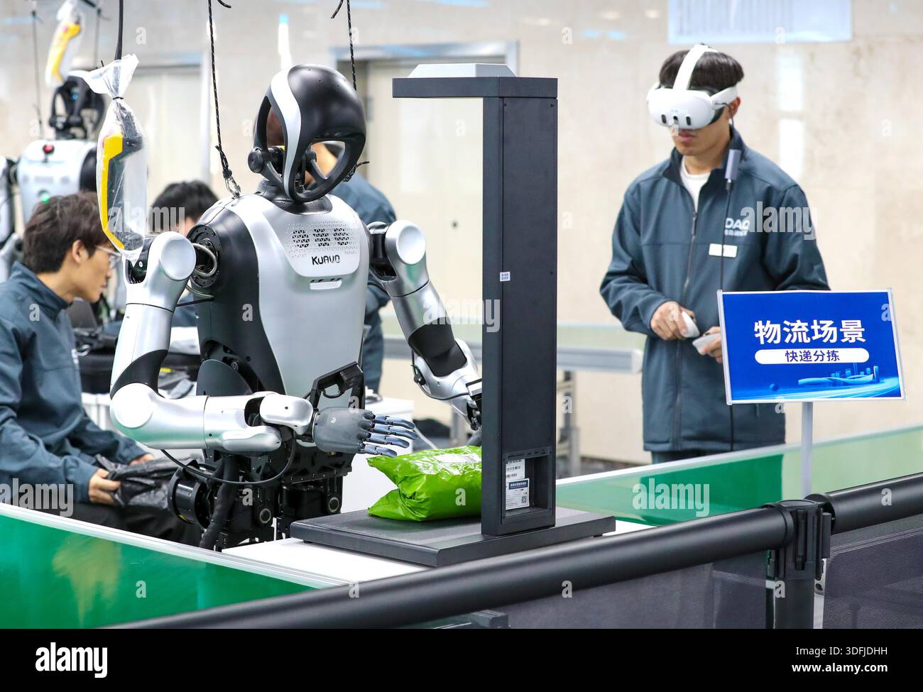 Robots practice grasping objects at a humanoid robot data collection ...