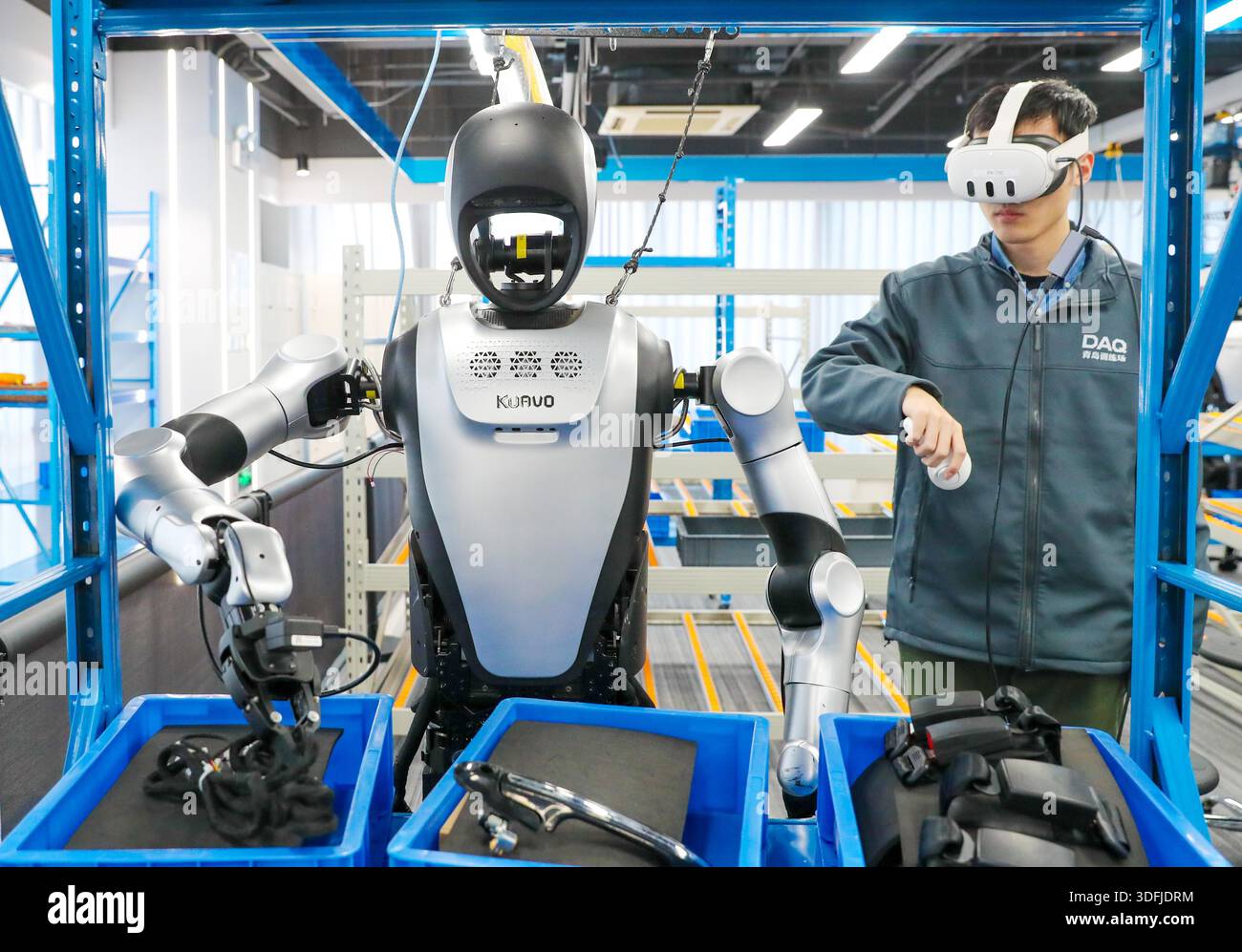 Robots practice grasping objects at a humanoid robot data collection ...