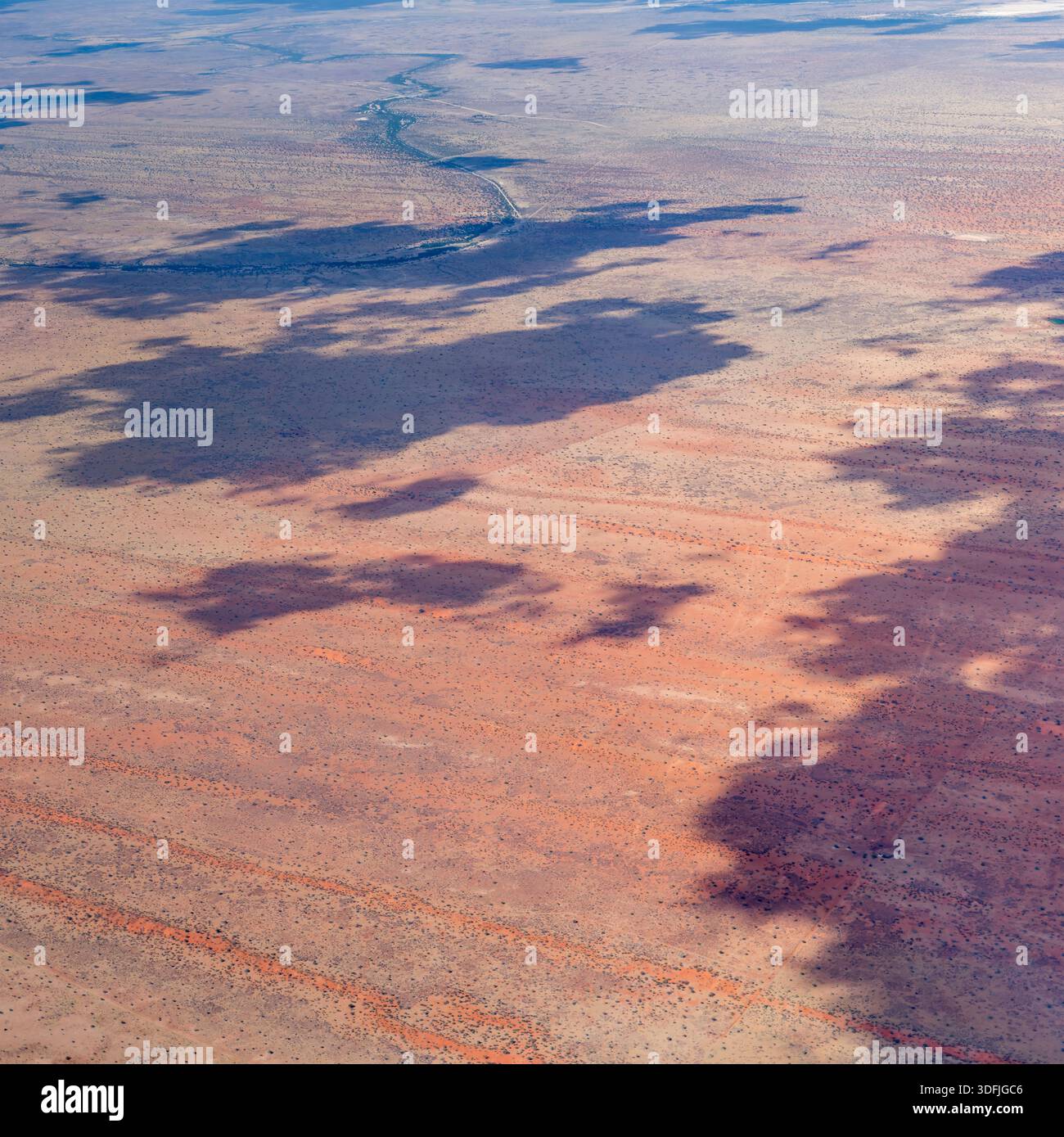 aerial landscape with red barren soil at Kalahari desert, shot from a ...