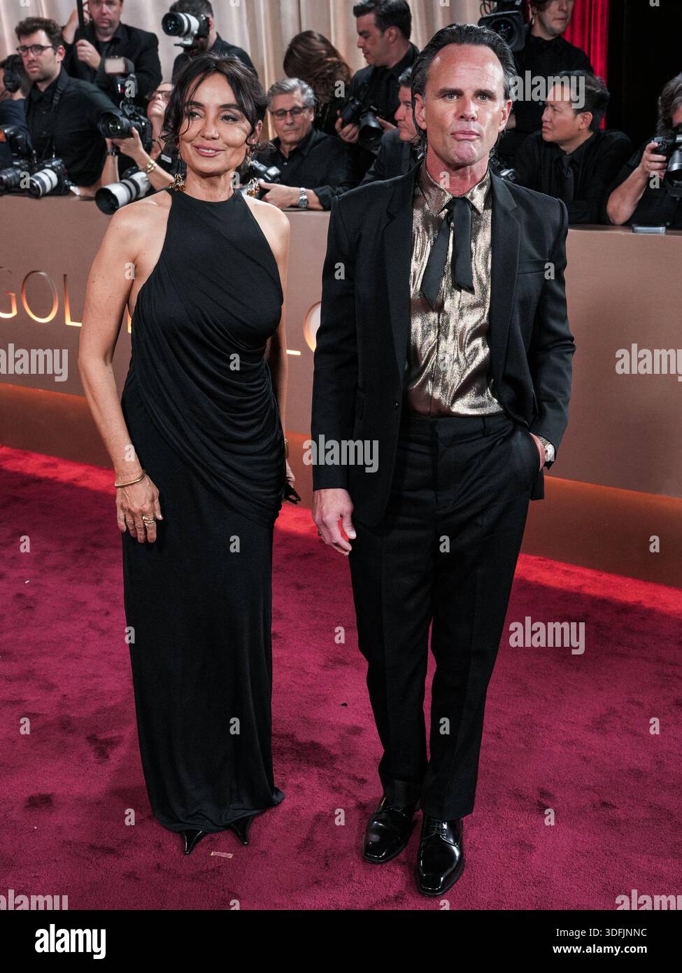 Nadia Conners and Walton Goggins attending the 83rd Golden Globes ...