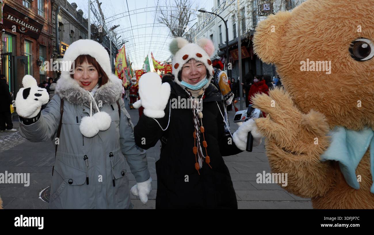 A traditional wedding procession moves through the Baroque-style ...
