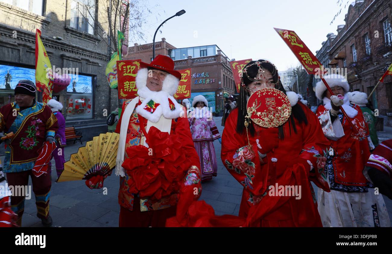 A traditional wedding procession moves through the Baroque-style ...