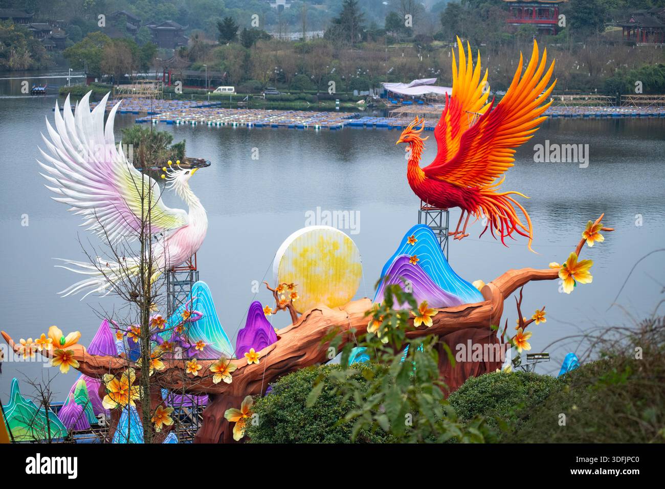 Workers construct lantern installations at Chongqing Expo Park for the ...