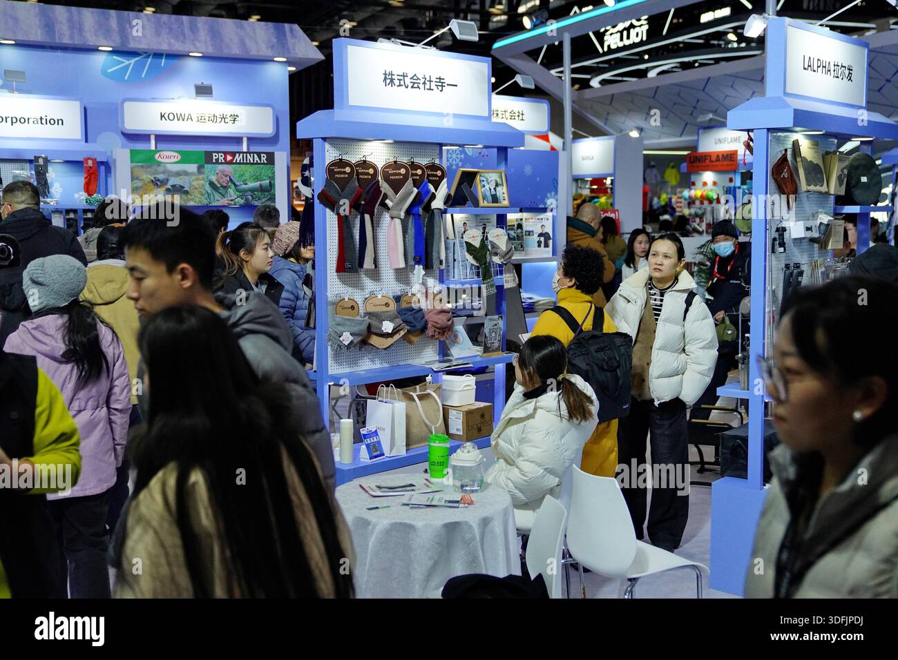 People visit the ISPO Beijing 2026 exhibition in Beijing, China, 10 ...