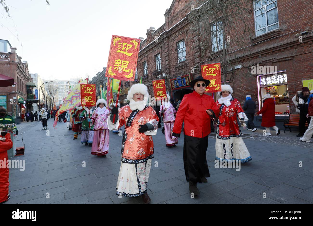 A traditional wedding procession moves through the Baroque-style ...