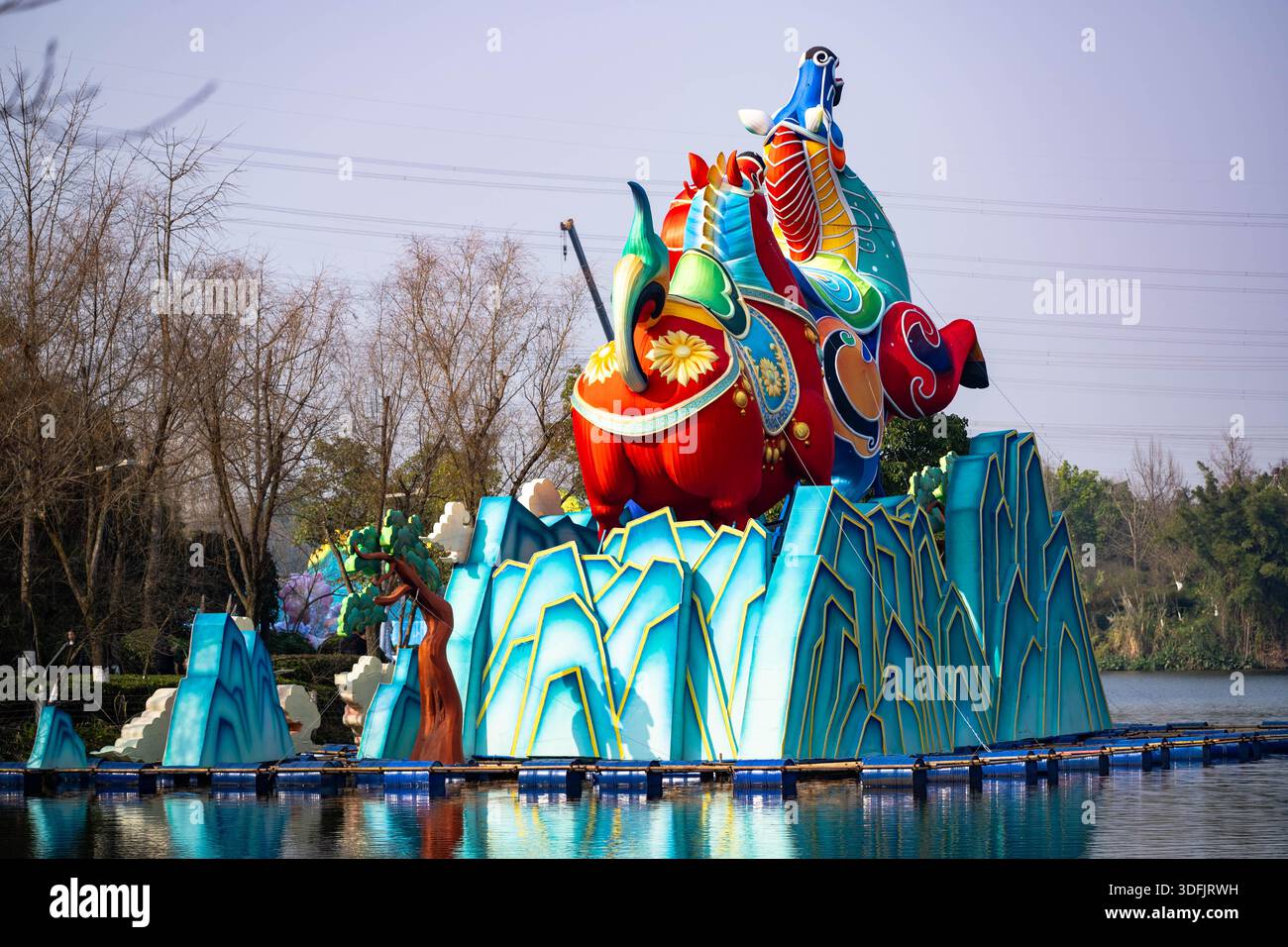 Workers construct lantern installations at Chongqing Expo Park for the ...