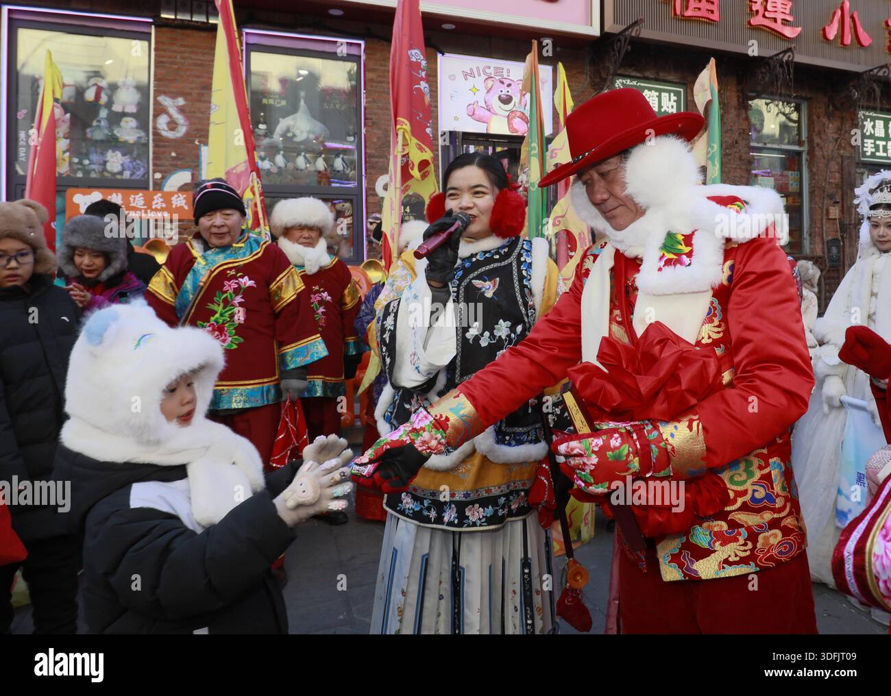 A traditional wedding procession moves through the Baroque-style ...