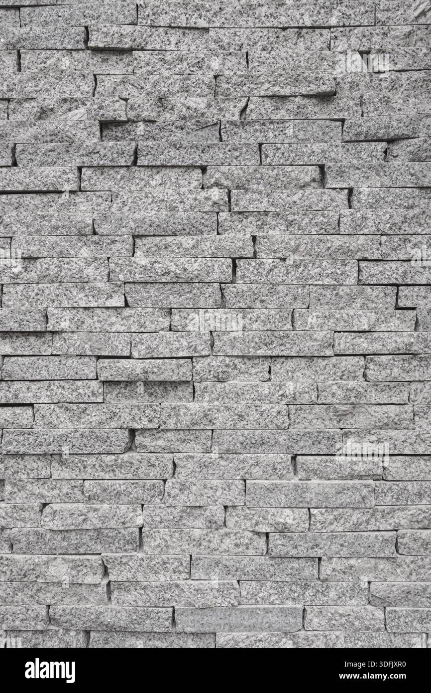 Gray wall of rough brick. Abstract construction background Stock Photo ...