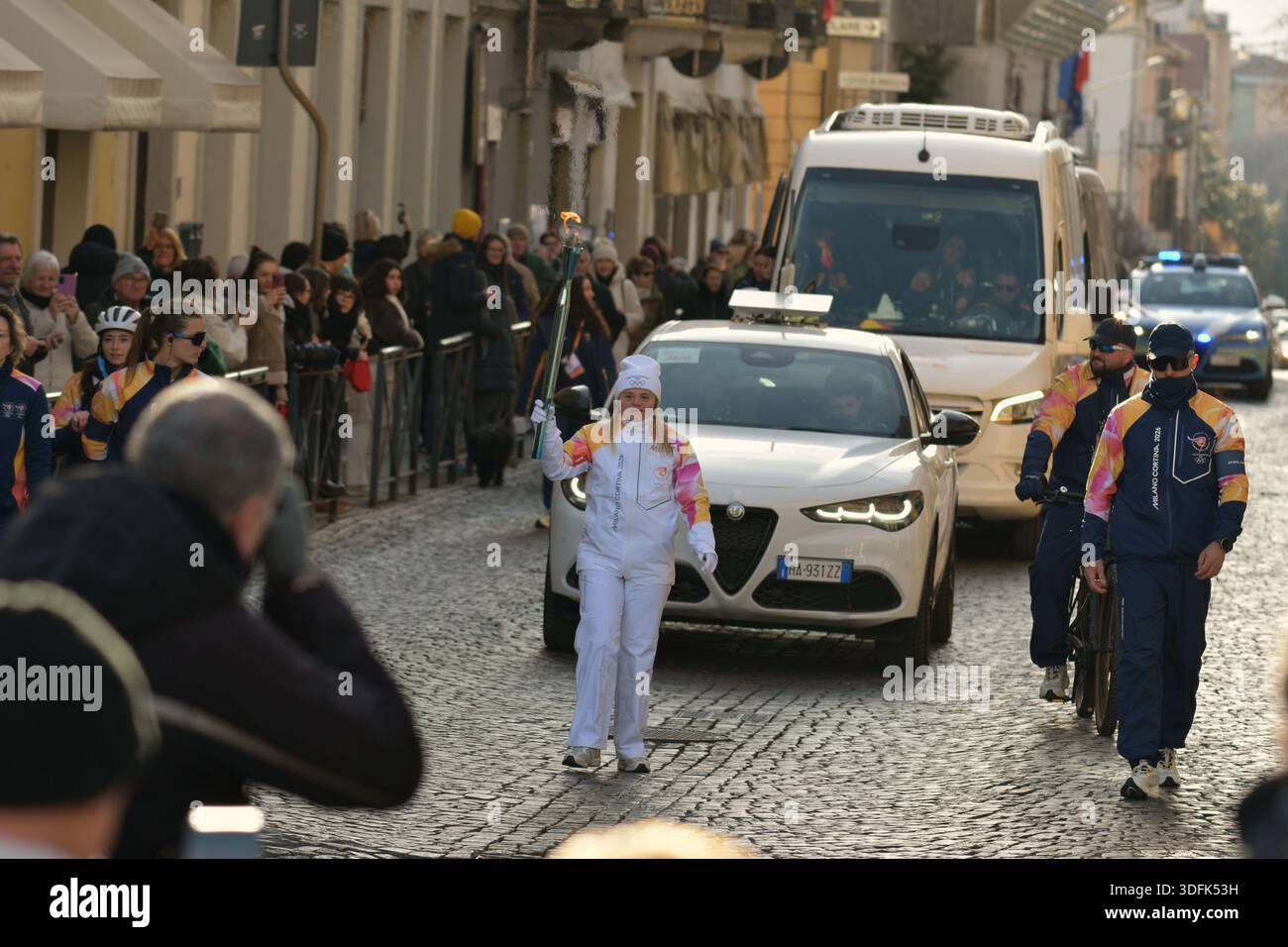 The Olympic torch carried by Nicole Orlando through Biella city center ...