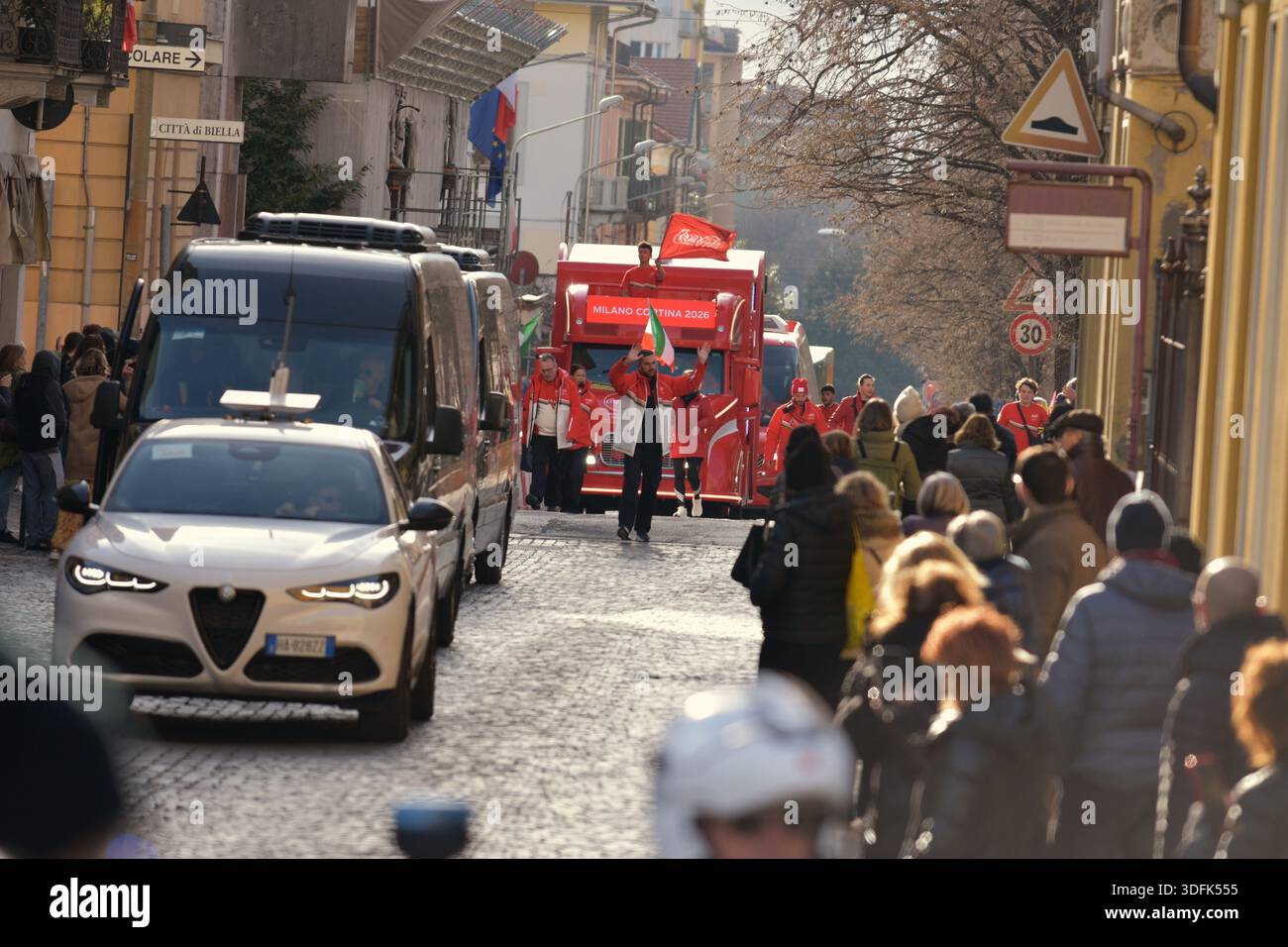 The Olympic torch through Biella city center Stock Photo - Alamy