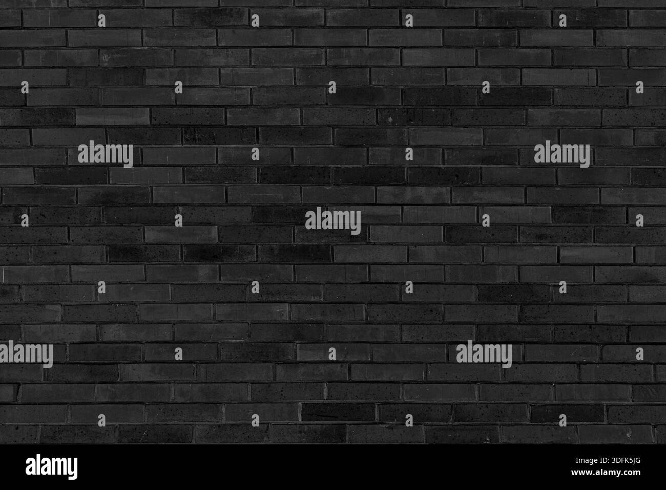 Texture of an old black brick wall. Abstract construction background ...