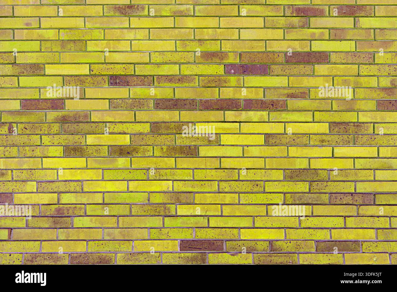 Texture of an old yellow brick wall. Abstract construction background ...