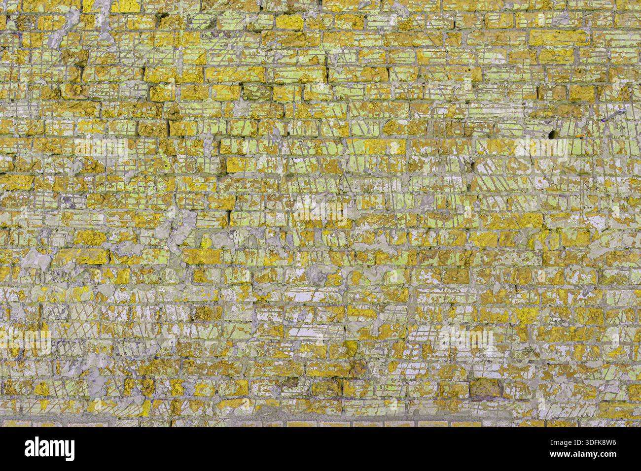 Texture of an old yellow brick wall. Abstract construction background ...