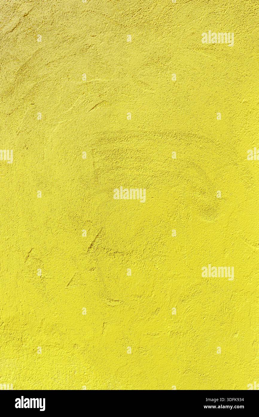 Texture of an old yellow plastered wall. Abstract construction ...