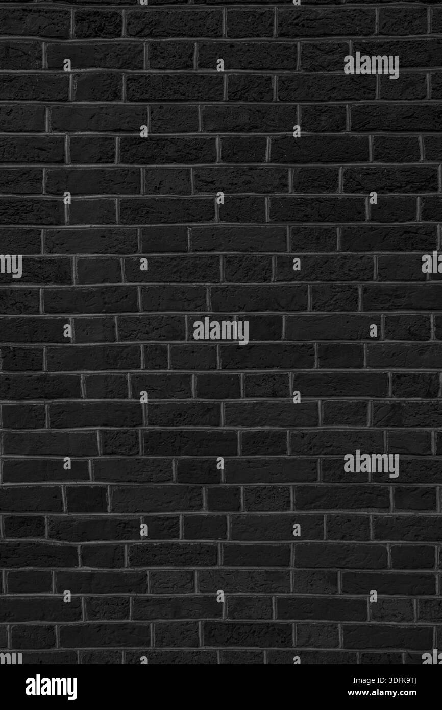 Old black brick wall. Abstract construction background Stock Photo - Alamy