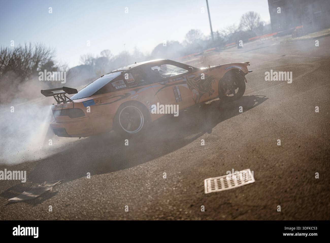 Imola, italy 01 january 2026: orange racing car performing a power ...