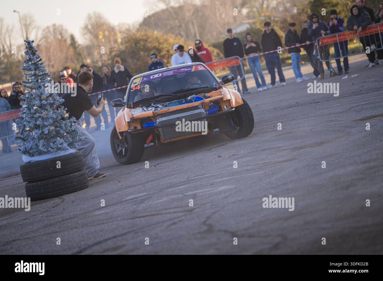 Imola, italy 01 january 2026: modified drift car powers a smoky burnout ...