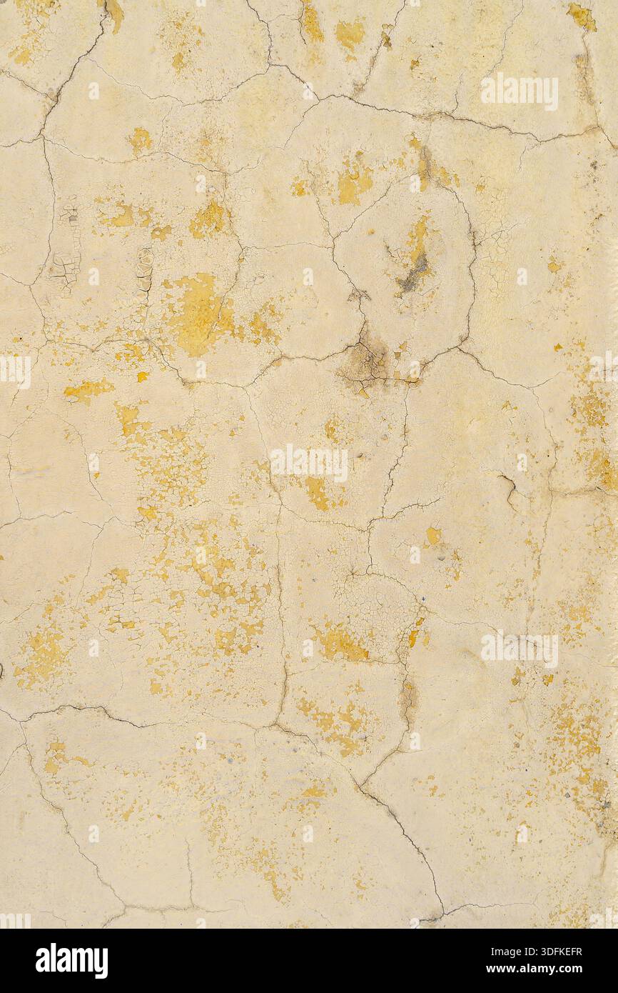 Yellow cracked paint on the wall. Abstract design background Stock ...