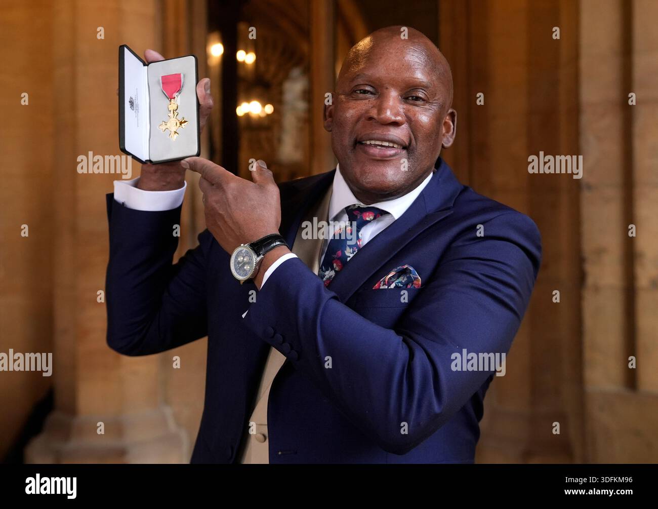 Devon Malcolm after being made an Officer of the Order of the British ...