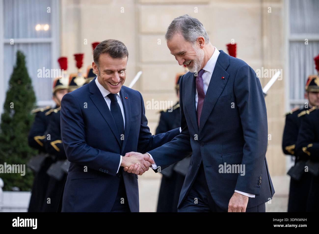 France's President Emmanuel Macron and his wife Brigitte Macron welcome ...