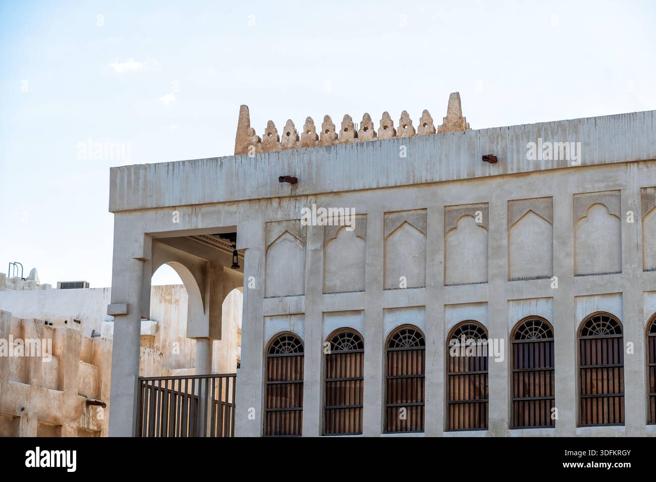 Explore traditional Middle Eastern architecture. Historic beige facade ...