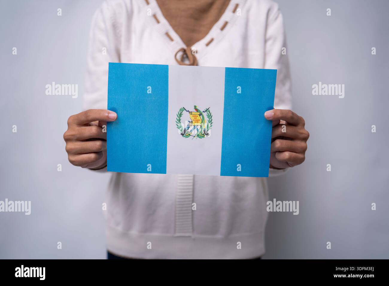 Hands Holding Flag of the Nation Guatemala Stock Photo - Alamy