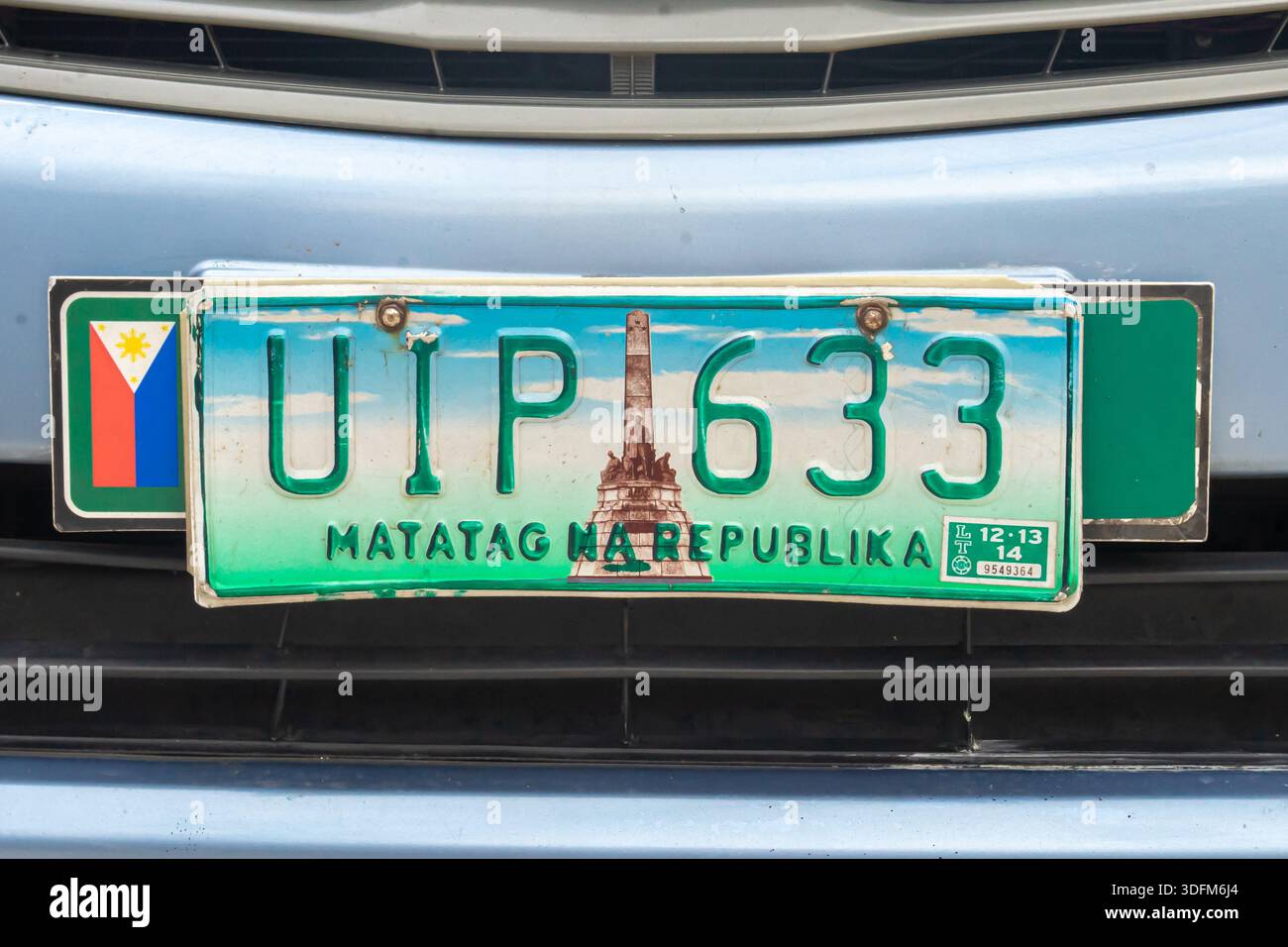Filipino vehicle license plate features the text "Matatag na republika ...
