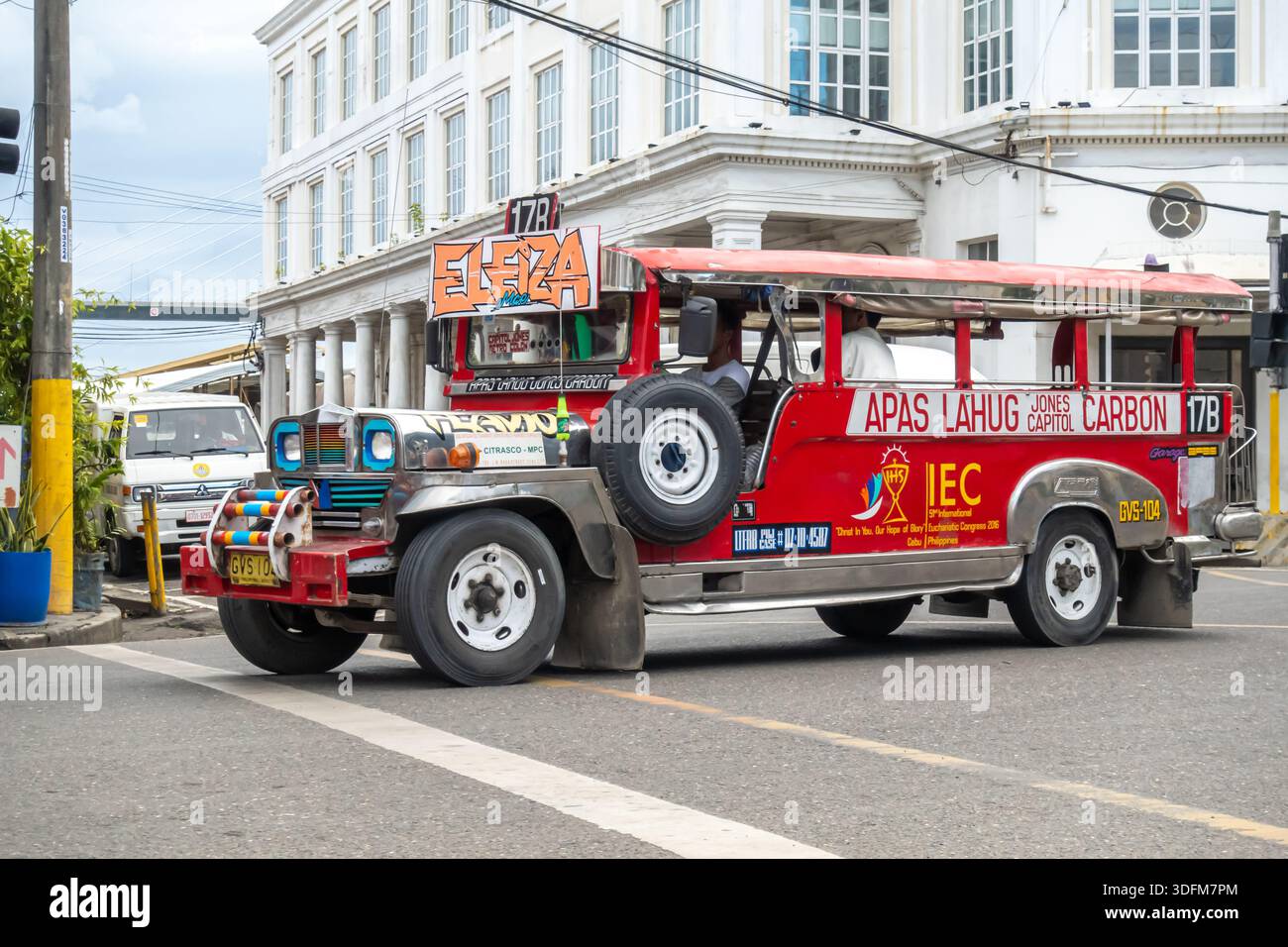 Red jeepney, an iconic and popular form of public transportation in the ...