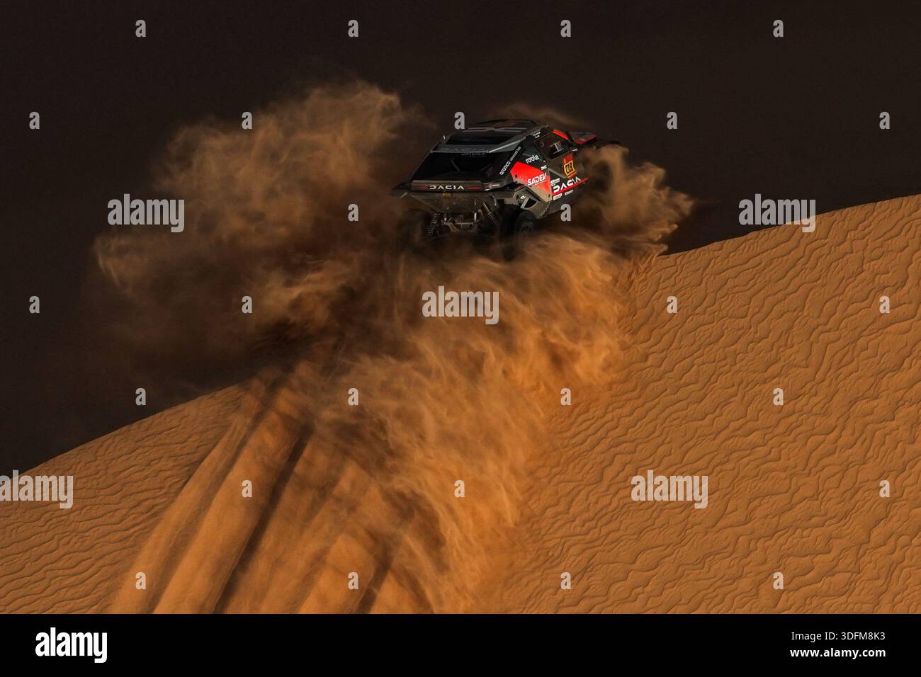 Driver Sebastien Loeb and co-driver Edouard Boulanger compete during ...