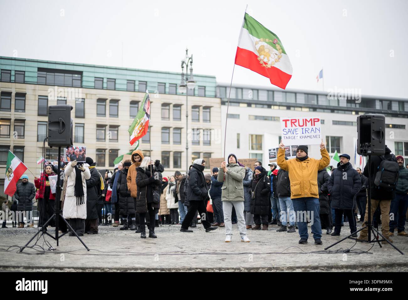 13 January 2026, Berlin: People take part in a demonstration in support ...