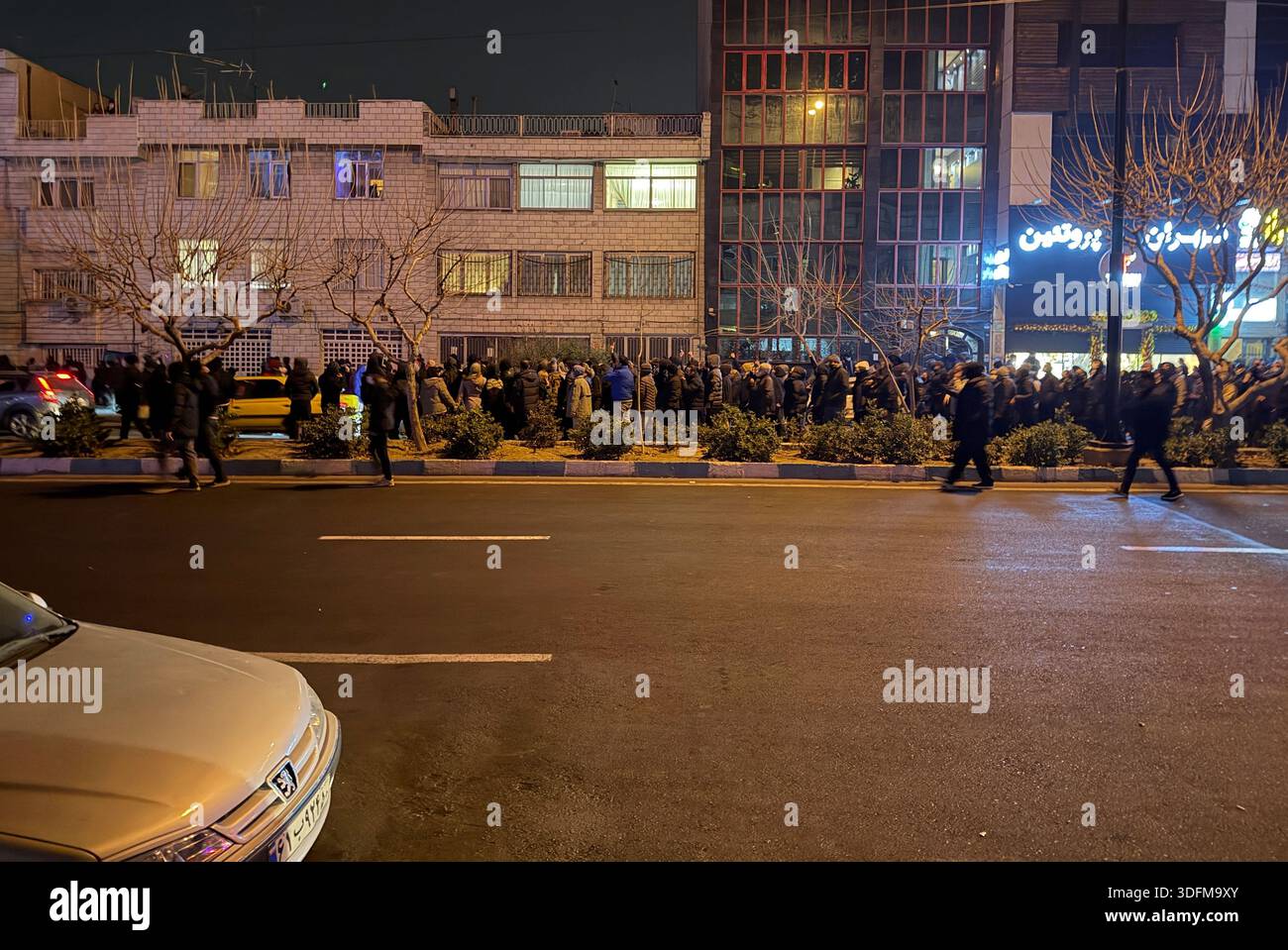 Iranians attend an anti-government protest in Tehran, Iran, Thursday ...