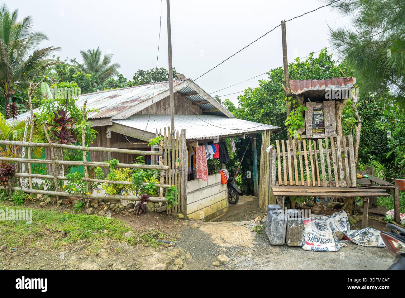 traditional rural house in the Philippines, a bahay kubo or nipa hut ...