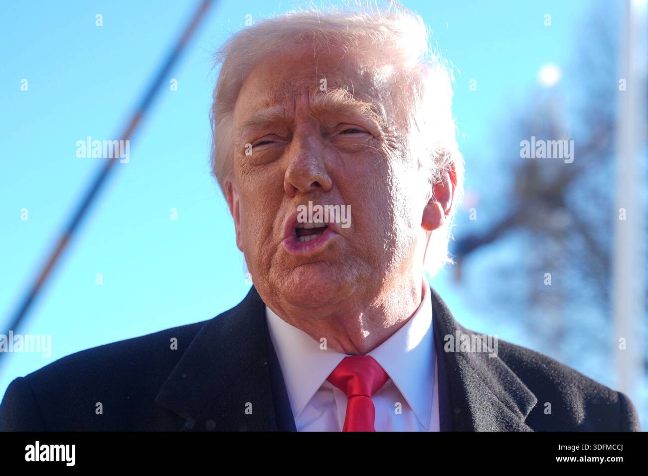 President Donald Trump speaks to reporters before boarding Marine One ...
