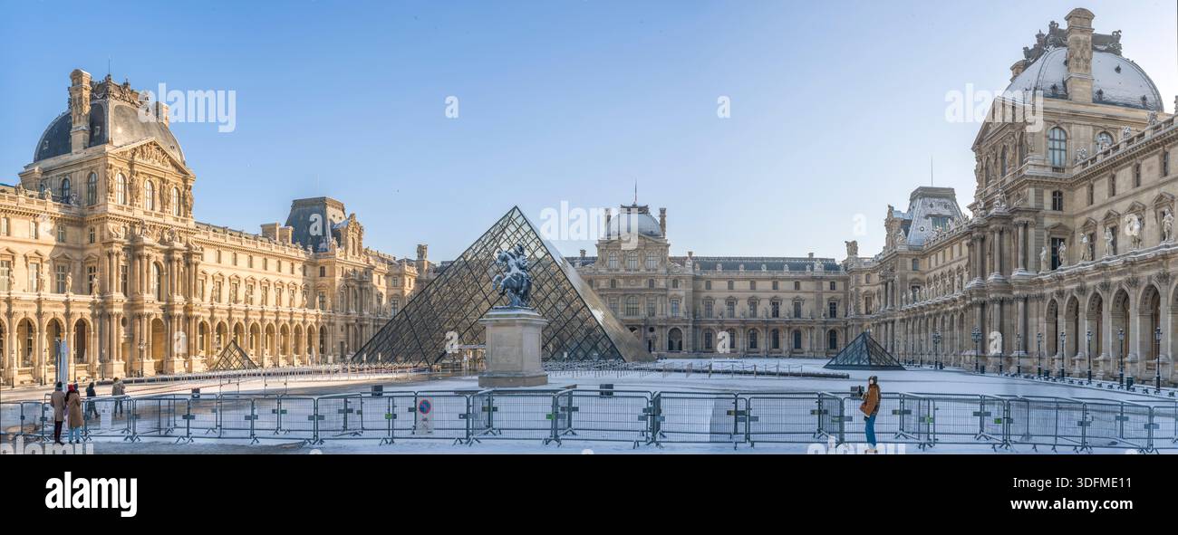 Paris, France - 01 07 2026: Snow flakes. Panoramic view of Louvre ...