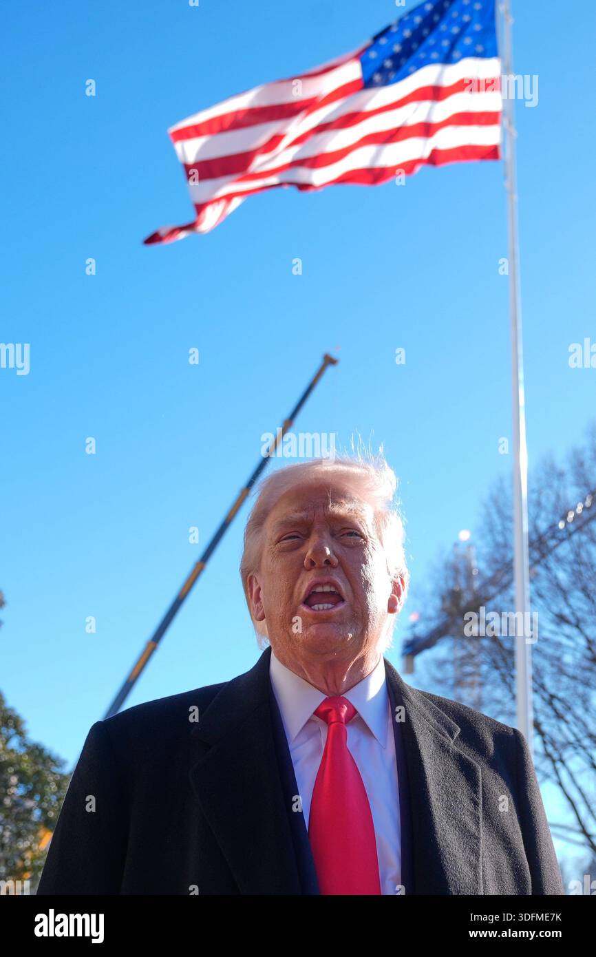 President Donald Trump speaks to reporters before boarding Marine One ...