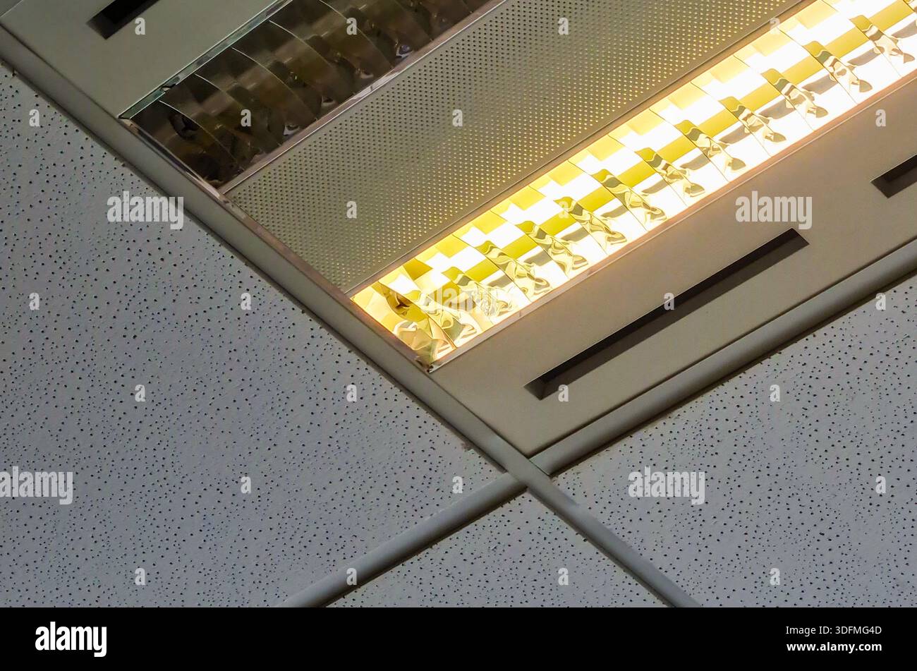 Illuminated Fluorescent Light Fixtures Integrated into a Perforated ...