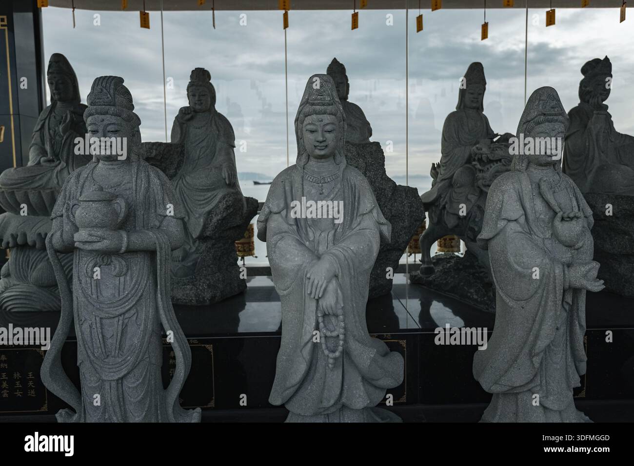 Statues of Guanyin goddess in the Floating Buddhist temple in Penang ...